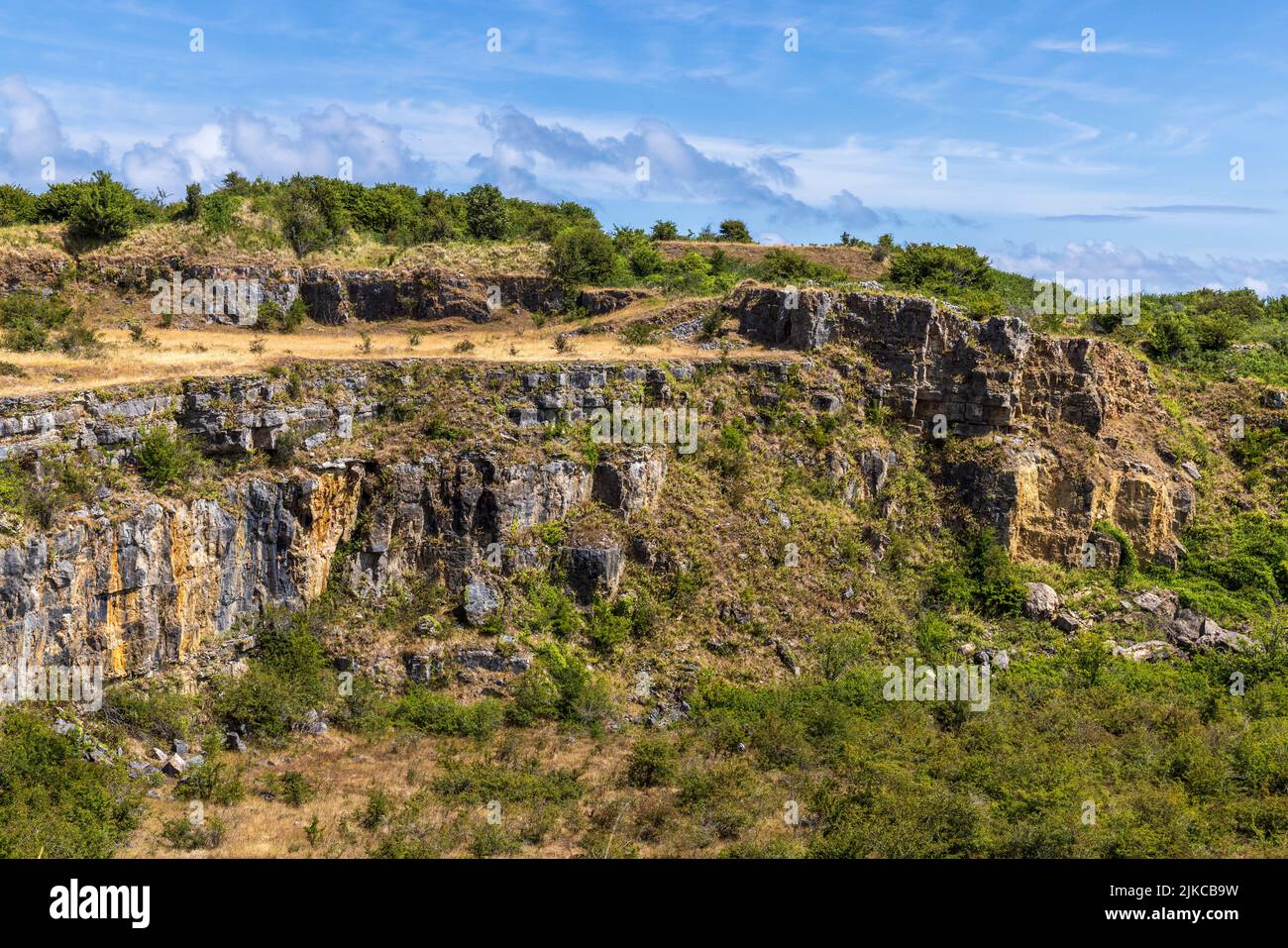 The disused Penmon Quarry on the Menai Strait, Isle of Anglesey, North ...