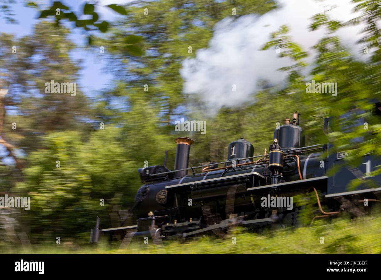 A blurred train in motion Stock Photo - Alamy