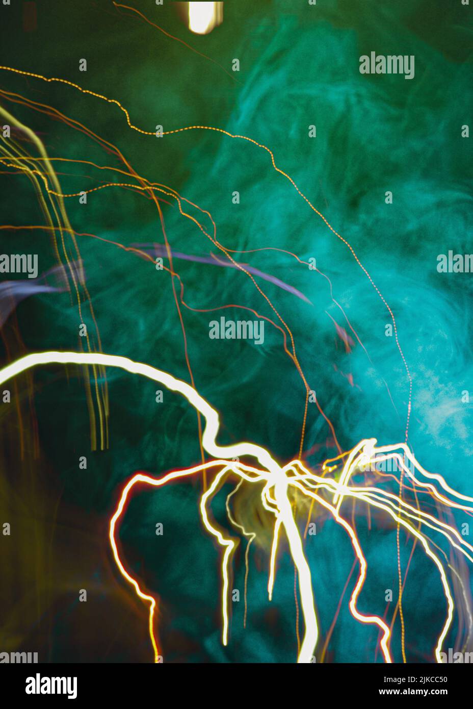 A vertical long exposure of light painting and smoke Stock Photo - Alamy