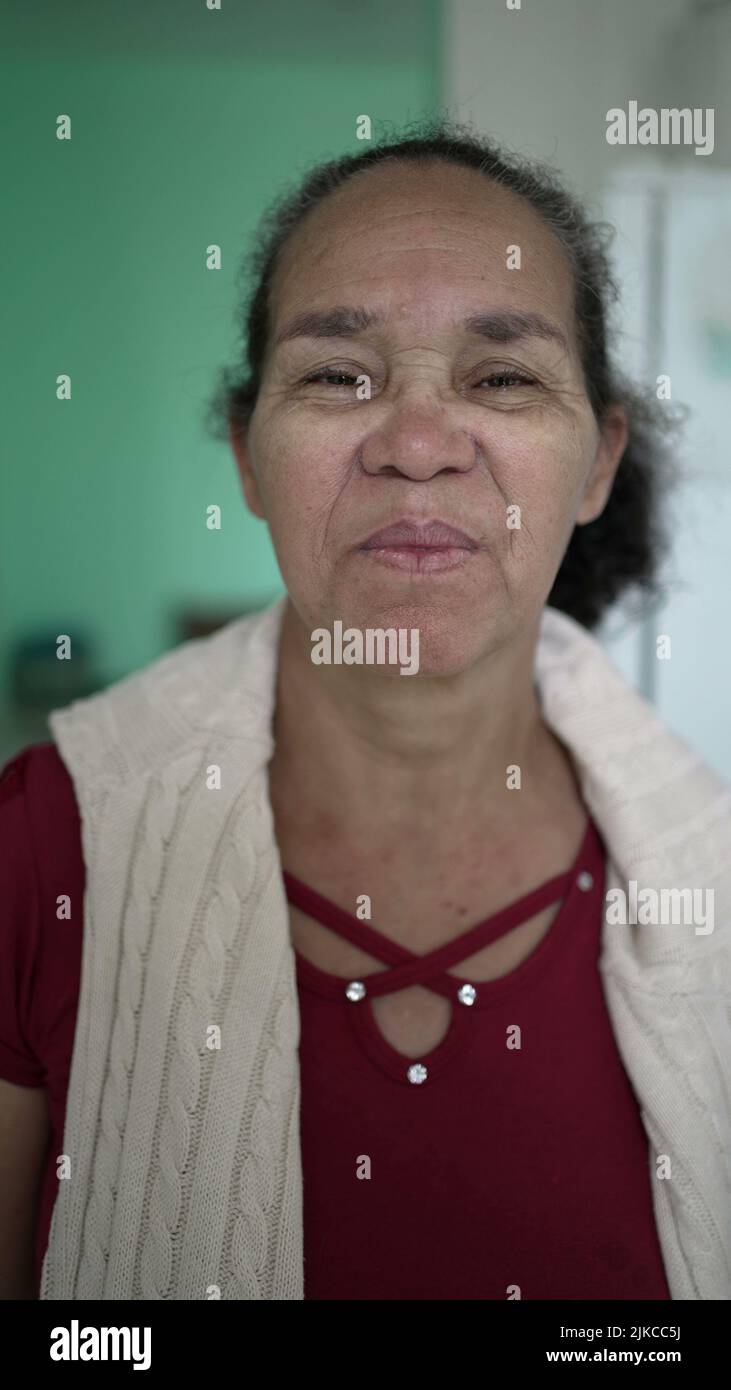 A Mature Hispanic Woman Portrait Face Looking At Camera An Older Latin South American Lady