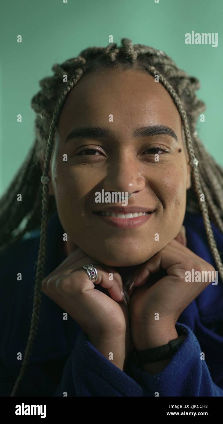 Portrait of a latina hispanic young woman. A black African girl with ...