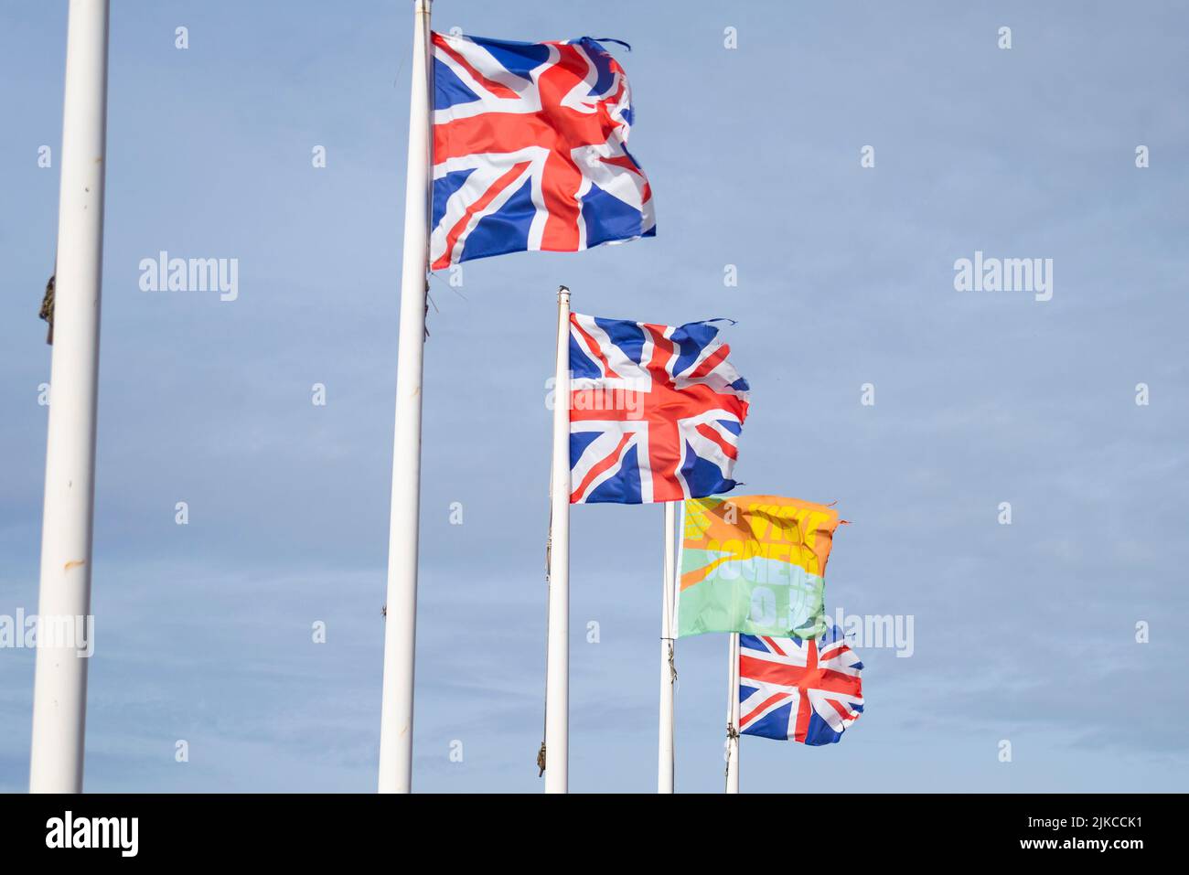 Visit Southend and Union Jack flags flying in strong wind on Western ...