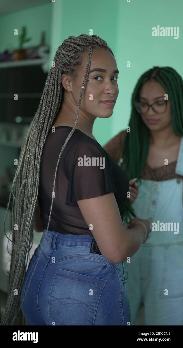 Young black hispanic woman with Box Braids hairstyle. A black latin ...