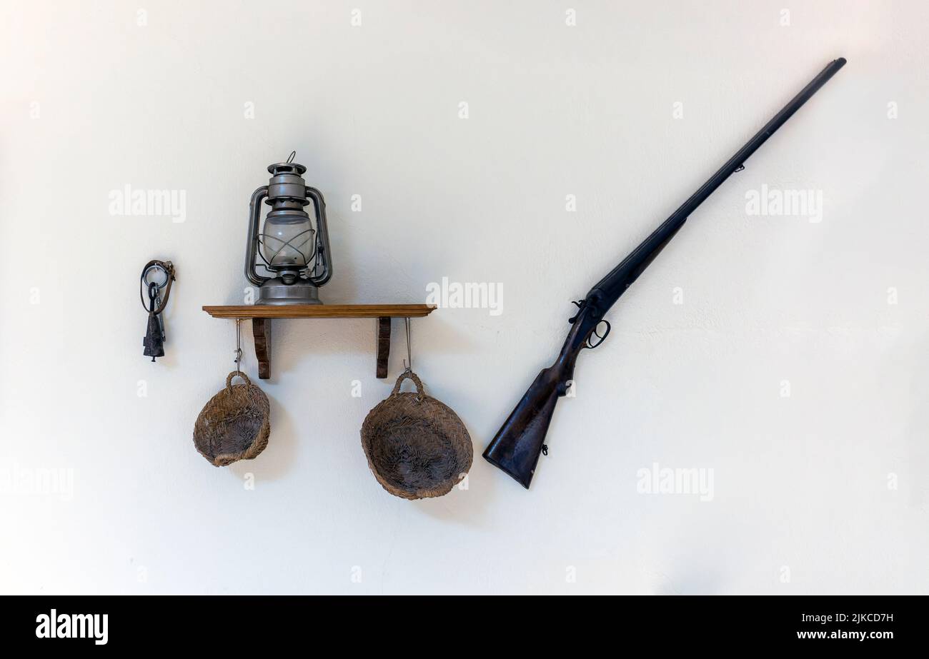decoration on the wall with field and hunting objects Stock Photo - Alamy
