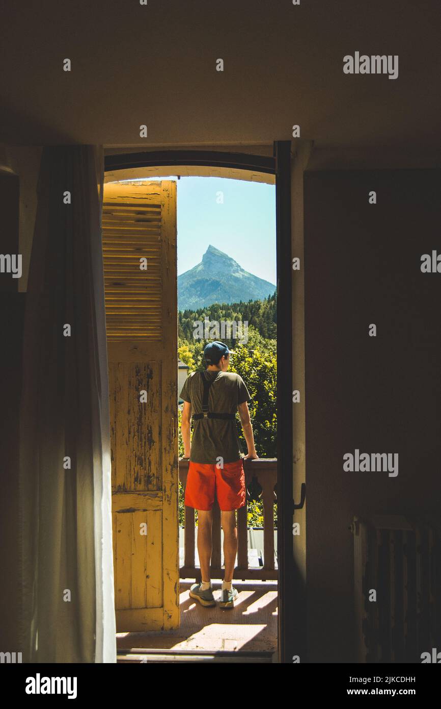 Man seen on balcony hi-res stock photography and images - Alamy