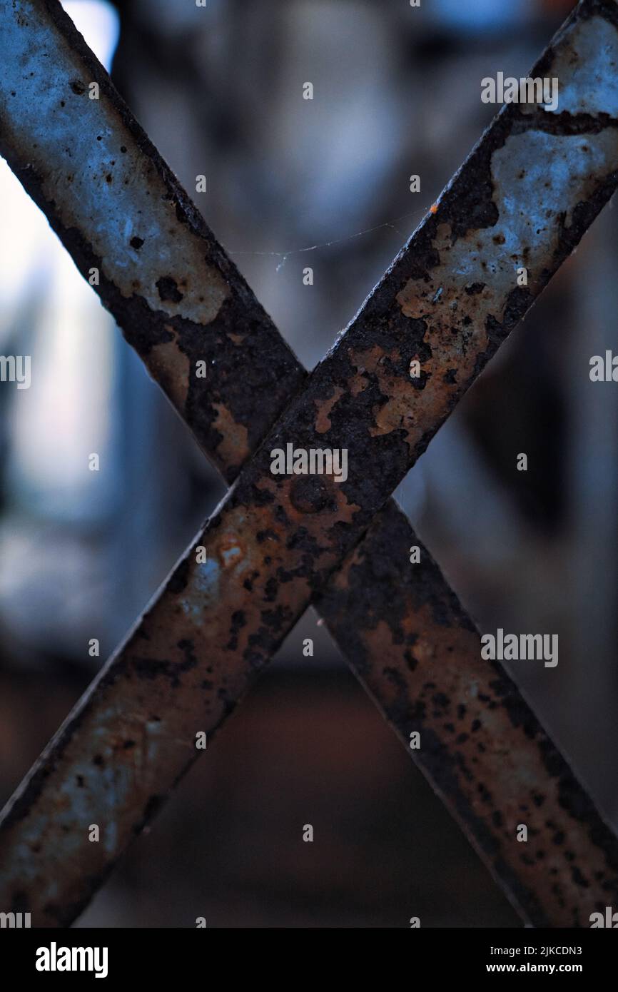 A vertical closeup shot of weathering steel pieces resembling the ...