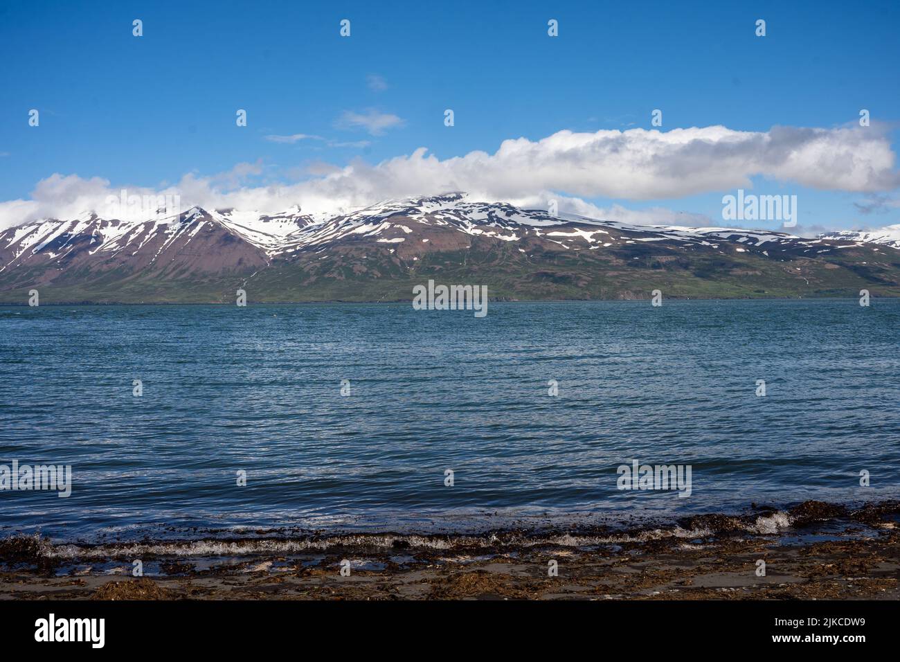 A natural landscape view of the mountains of Iceland with sea at the ...