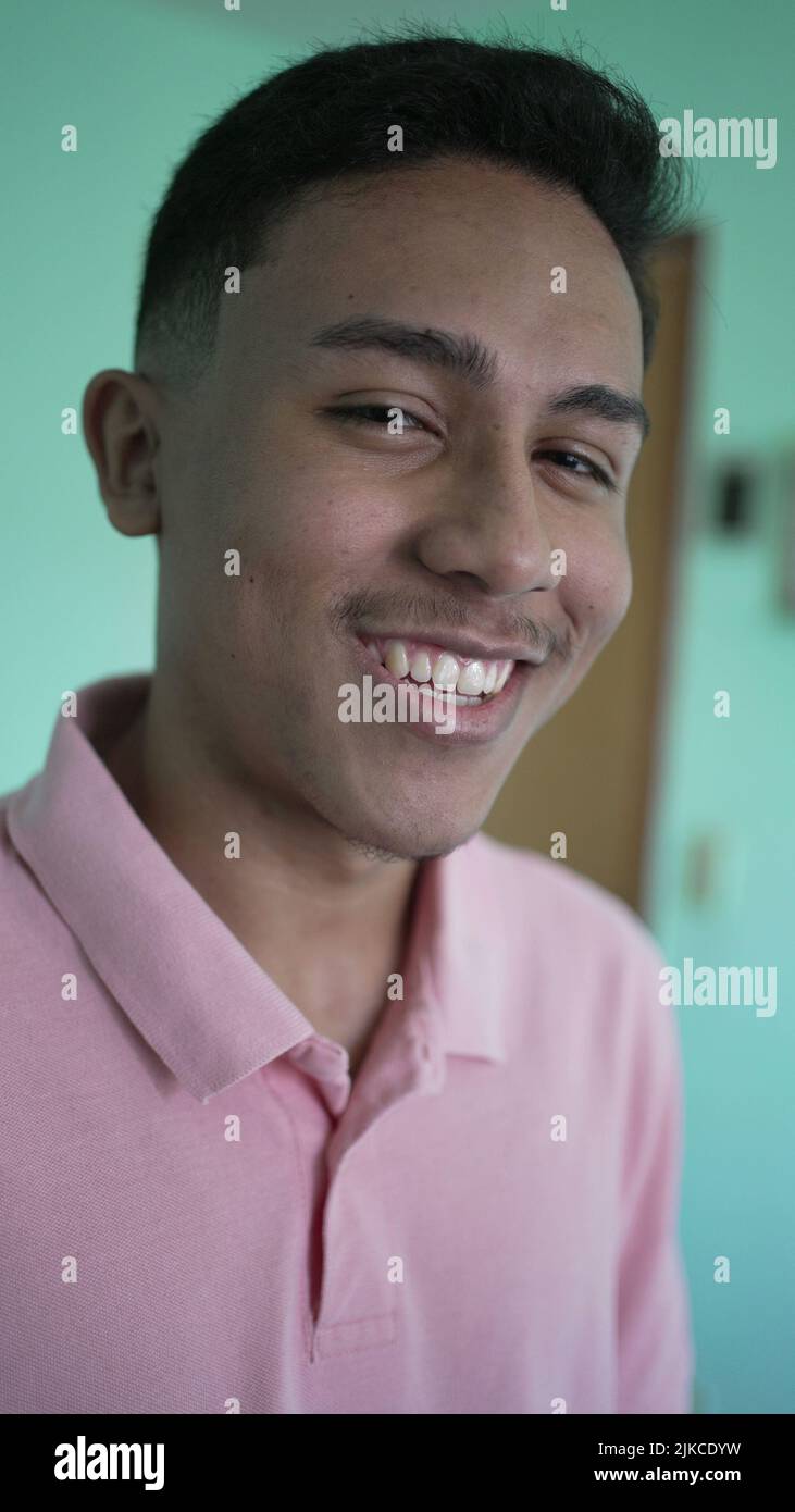 Vertical video smiling latin young hi-res stock photography and images ...