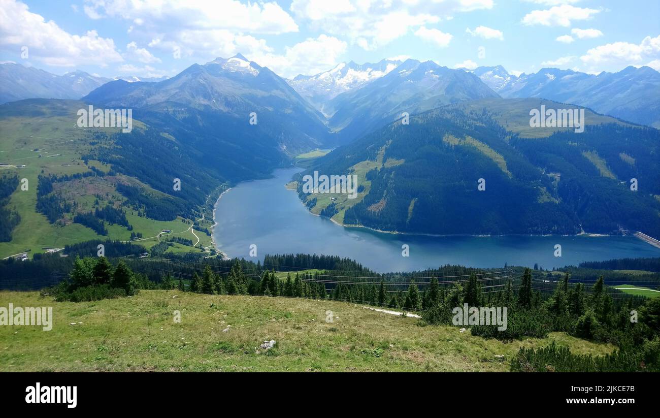 A high angle of a river flowing through mountains Stock Photo - Alamy