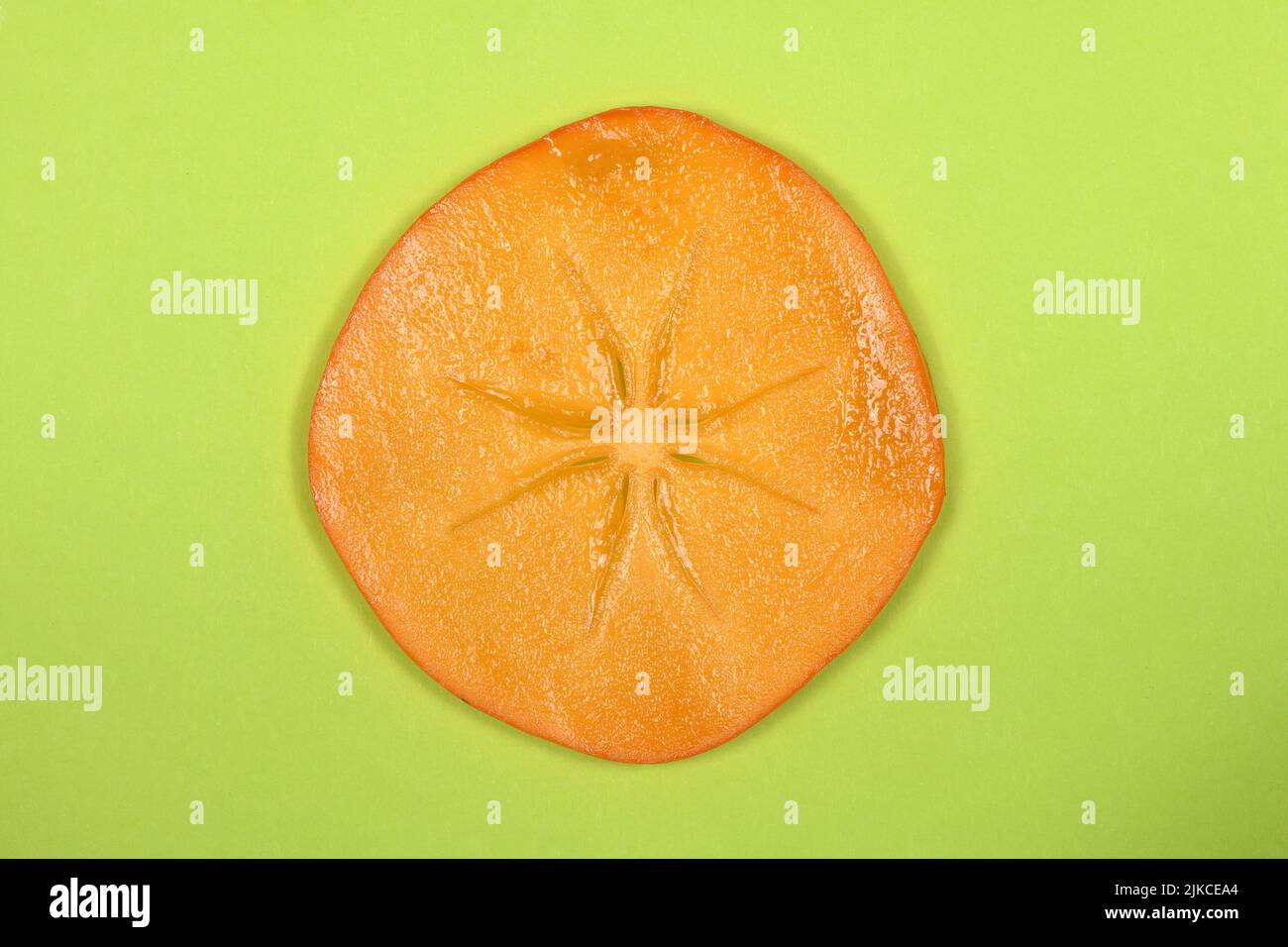 Orange ripe persimmon. Persimmon fruit. Orang fruits slice cut out. High resolution photo. Full ...