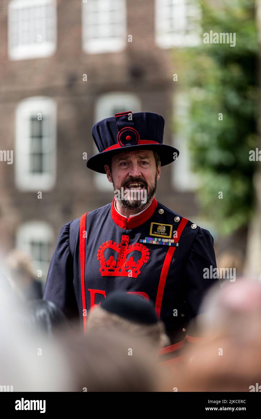 A close-up shot of Yeomen Warder in traditional clothes, in Beefeater ...