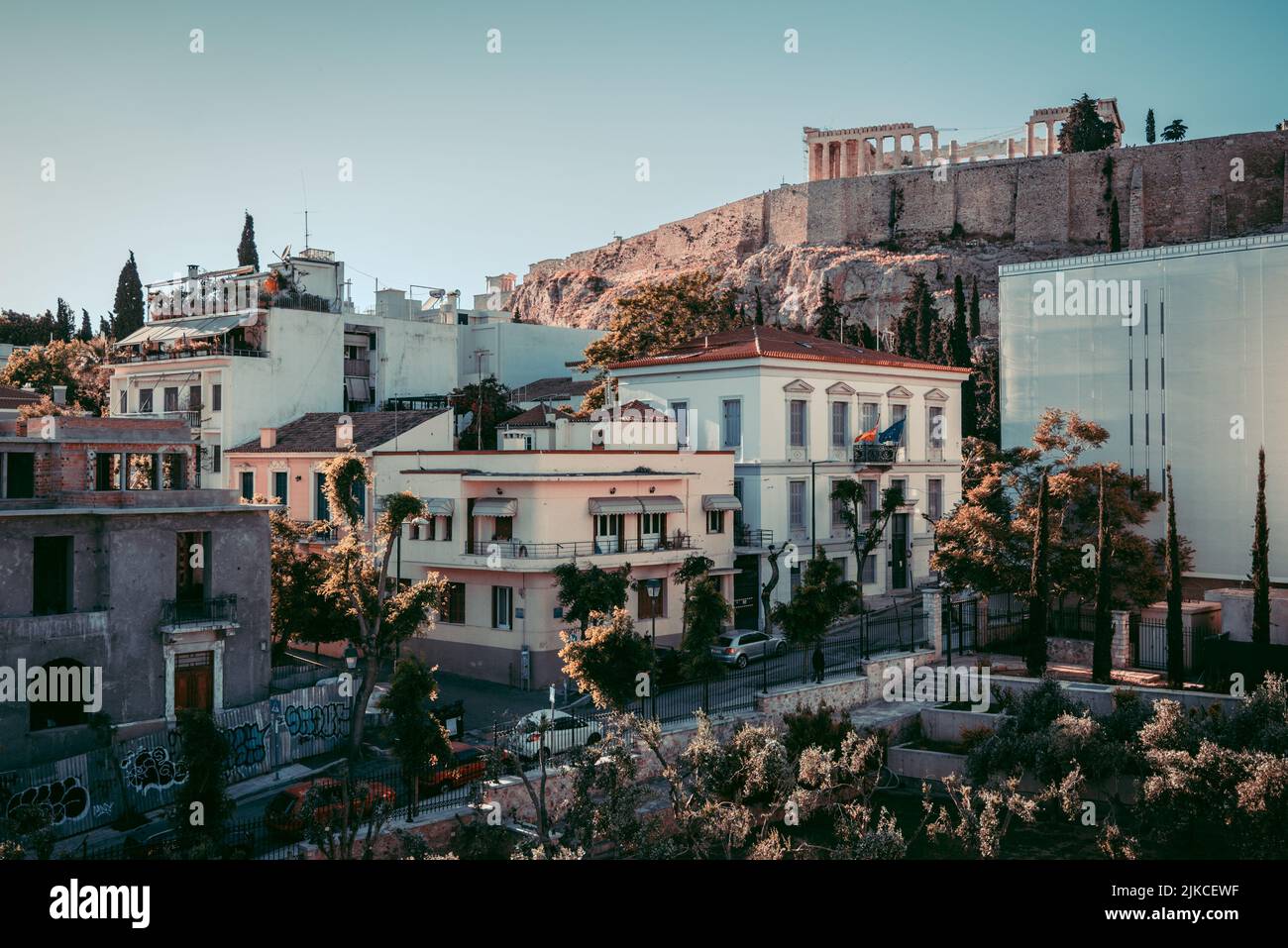 The city of Athens with white buildings and the Acropolis on the top of ...