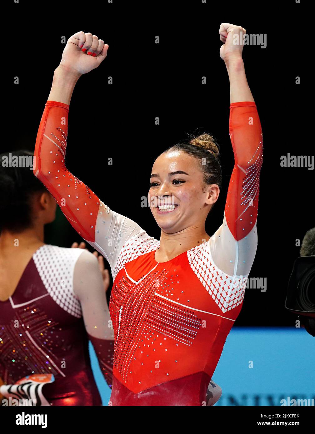 England's Georgia-Mae Fenton celebrates winning the Women's Uneven Bars ...