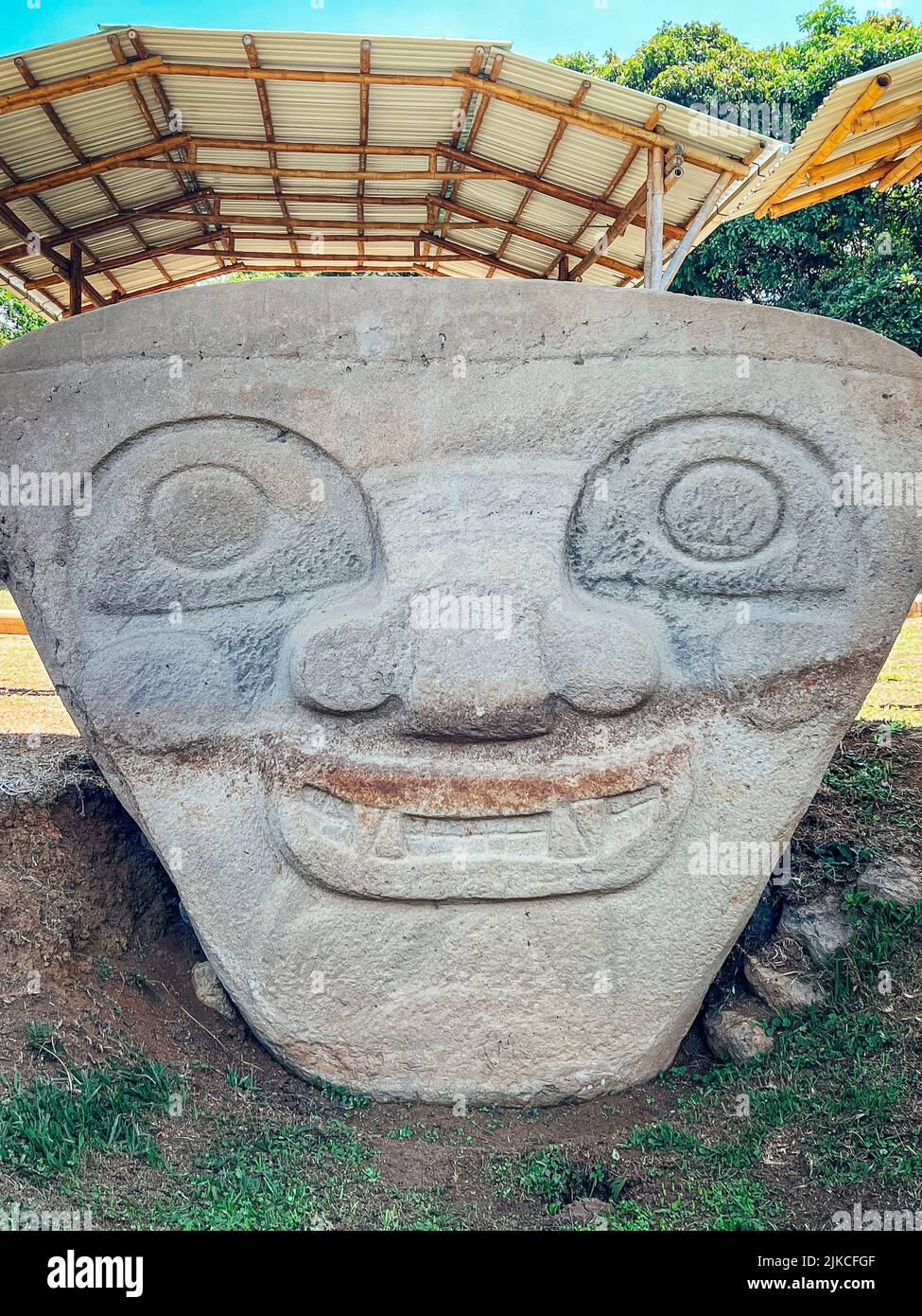 A vertical shot of a moai statue in San Agustin Columbia Stock Photo ...