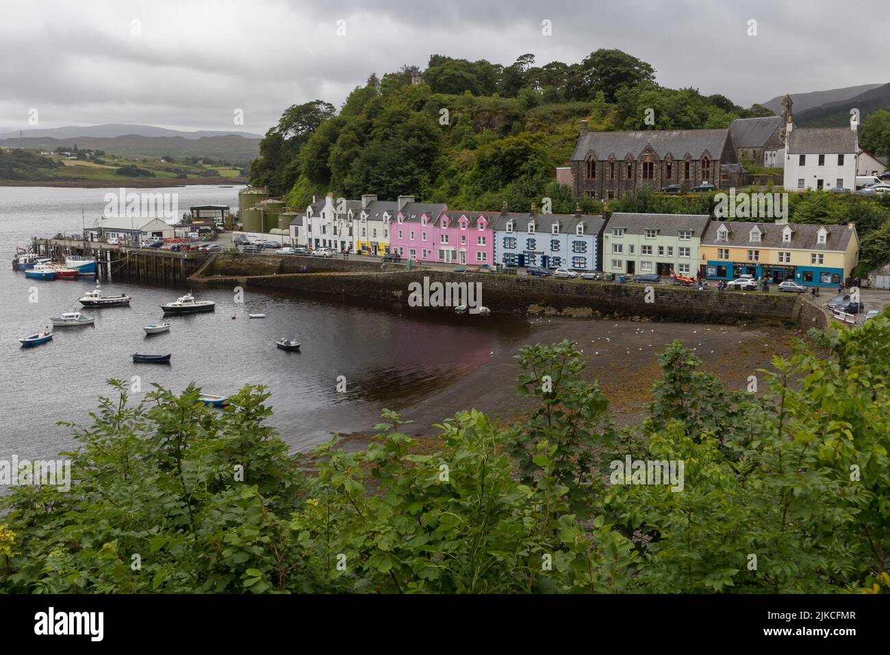 The colorful residential buildings along the coastline in The Isle of ...