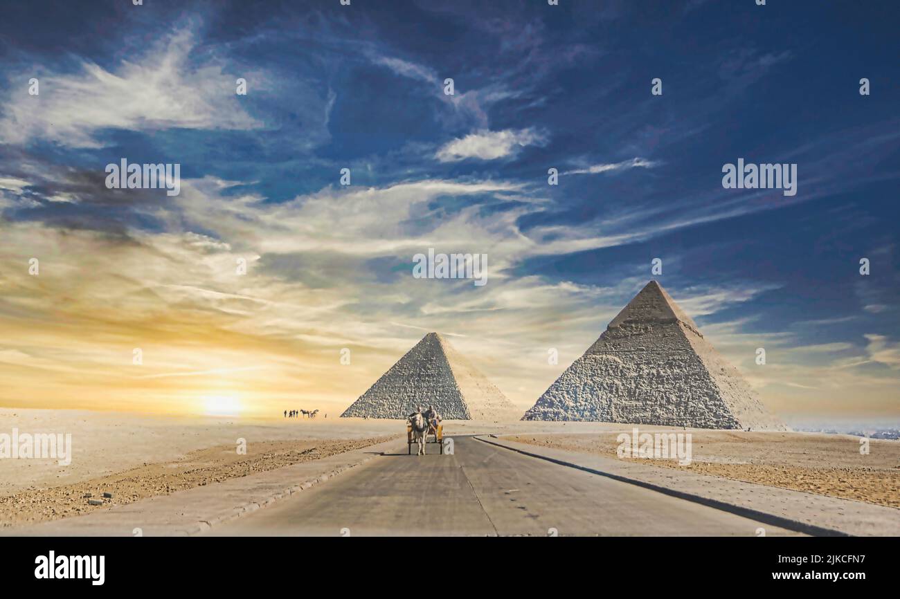A beautiful view of Egyptian pyramids under a cloudy sunset sky Stock ...