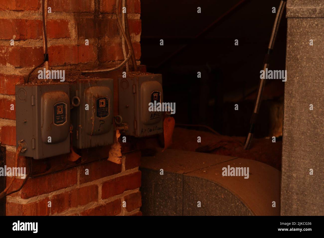 A close-up of electrical panel on a brick wall Stock Photo - Alamy