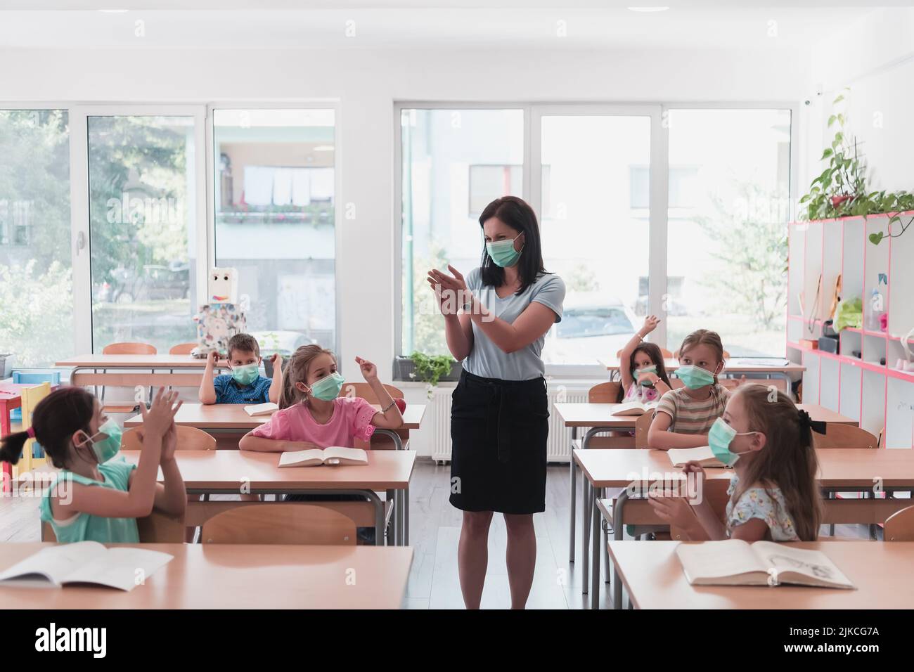 Preschool education. Students at school play interesting games with the ...