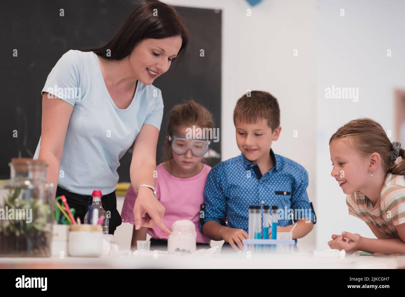 Elementary School Science Classroom: Enthusiastic Teacher Explains ...
