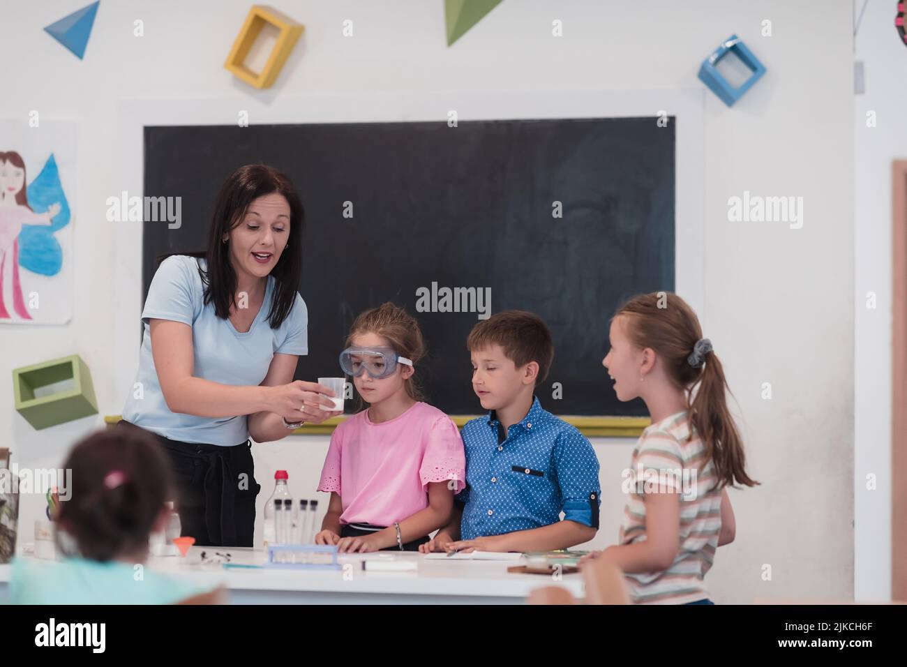 Elementary School Science Classroom: Enthusiastic Teacher Explains ...