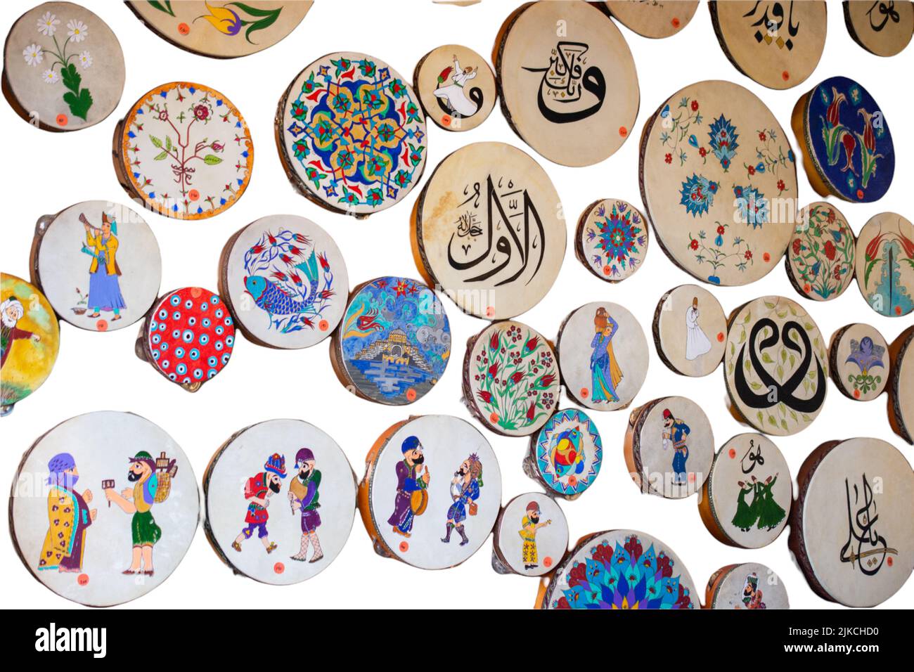 Different sizes of wooden plates covered with various decorations ...