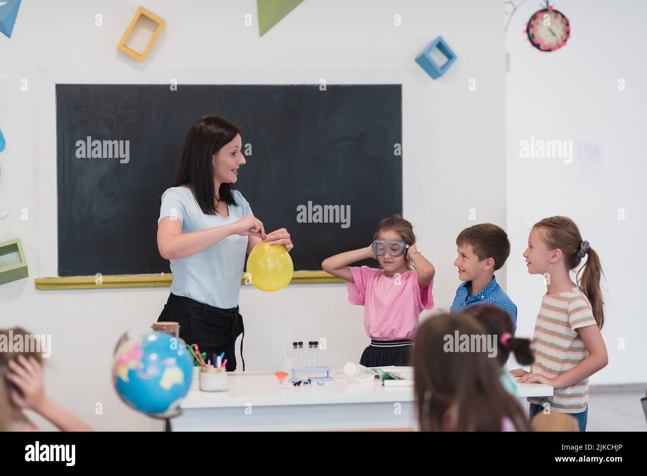 Elementary School Science Classroom: Enthusiastic Teacher Explains ...