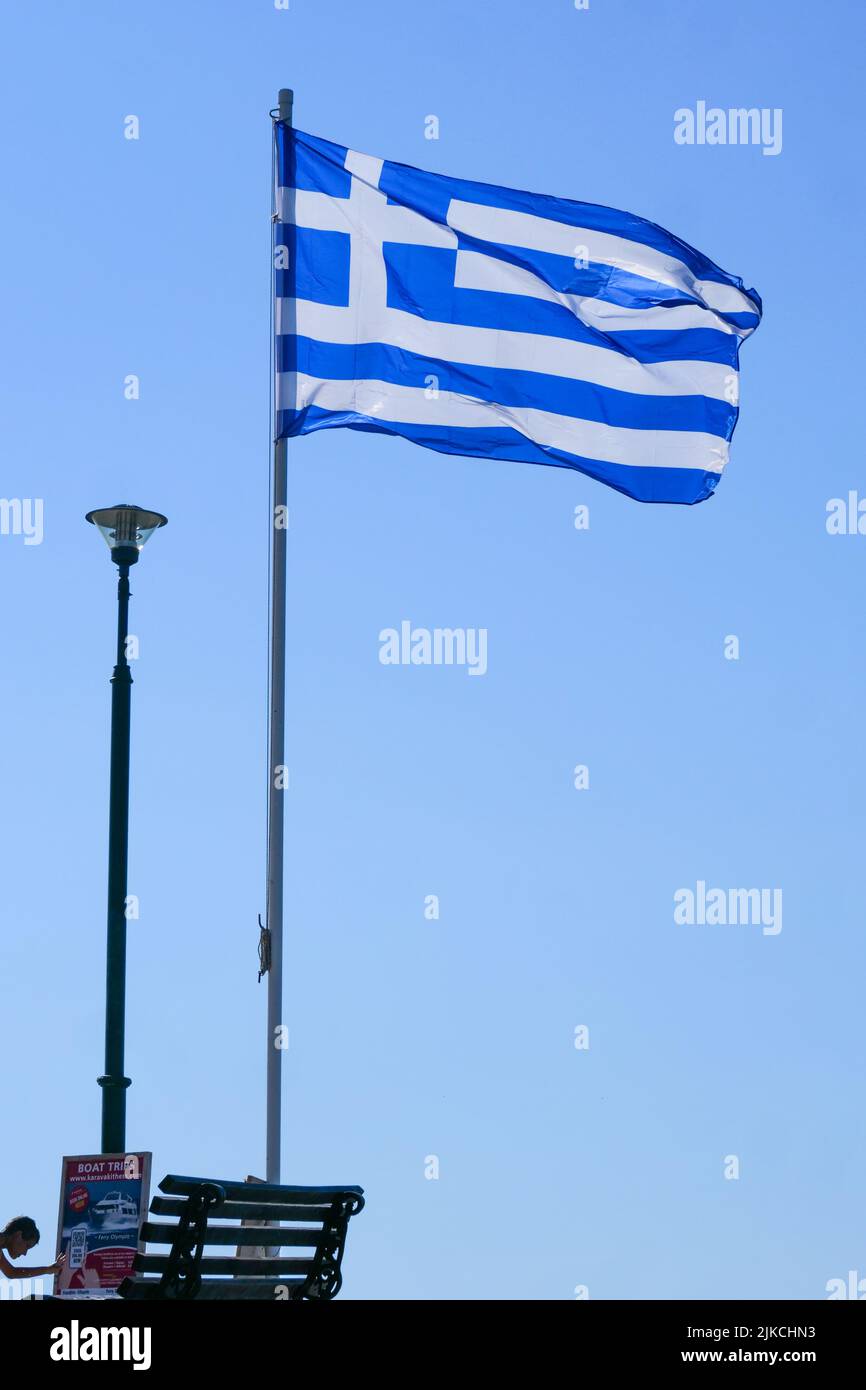 Greek flag waving in the wind, Aghia Triada, Thessaloniki Bay ...