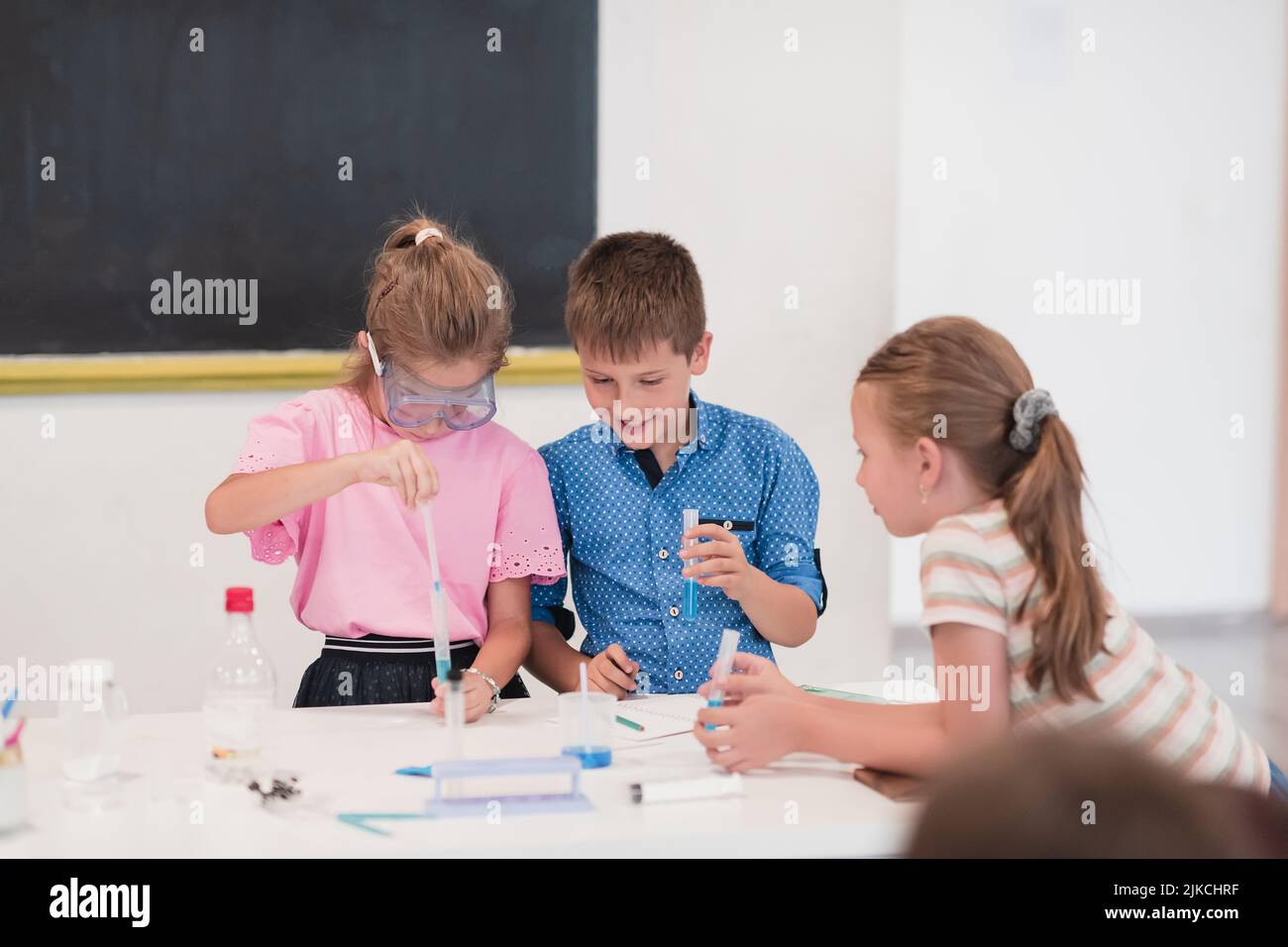 Elementary School Science Classroom: Enthusiastic Teacher Explains ...