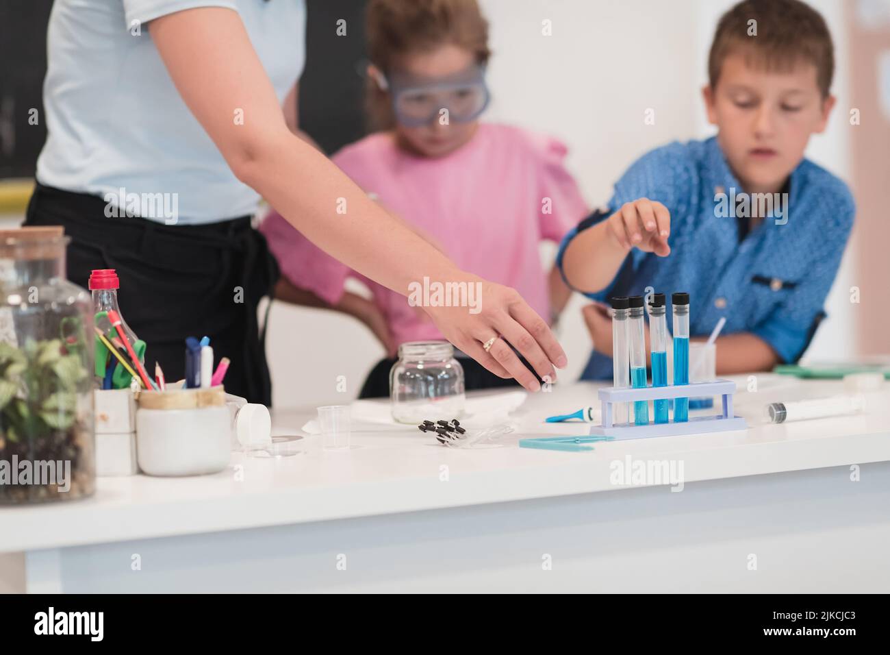 Elementary School Science Classroom: Enthusiastic Teacher Explains ...