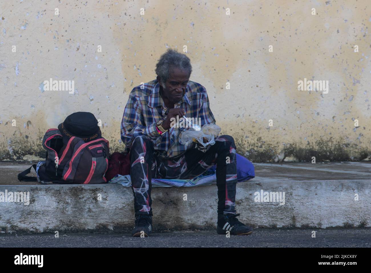 Poor man eating hi-res stock photography and images - Alamy