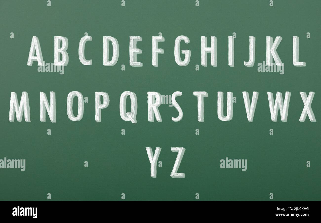 Decorative alphabet letters drawn on chalkboard. Letters written in ...