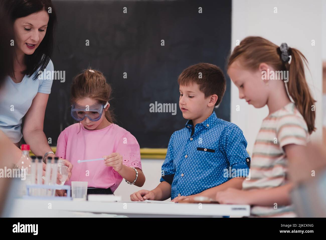 Elementary School Science Classroom: Enthusiastic Teacher Explains ...