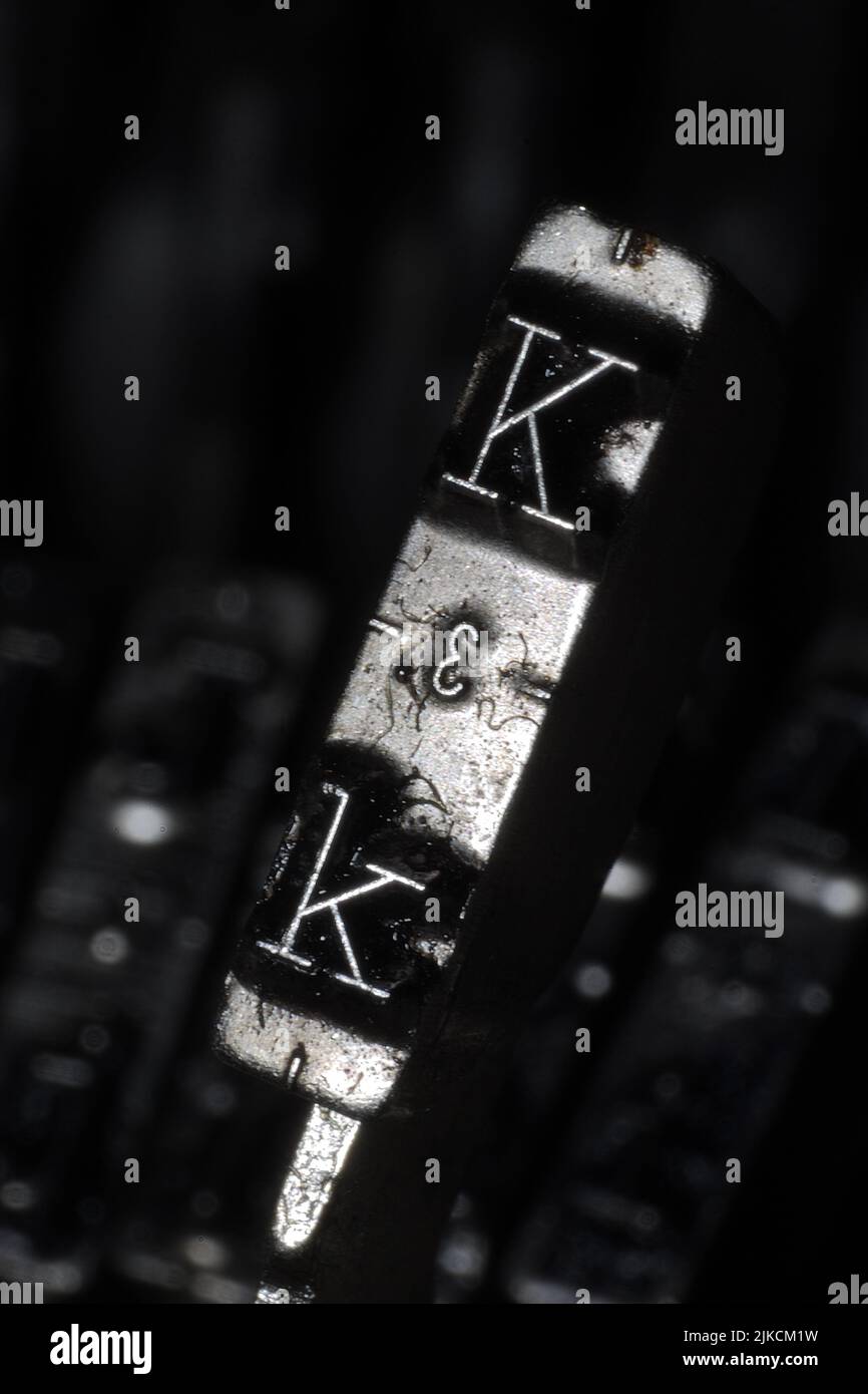 Letter K in a typo of an old manual typewriter Stock Photo - Alamy