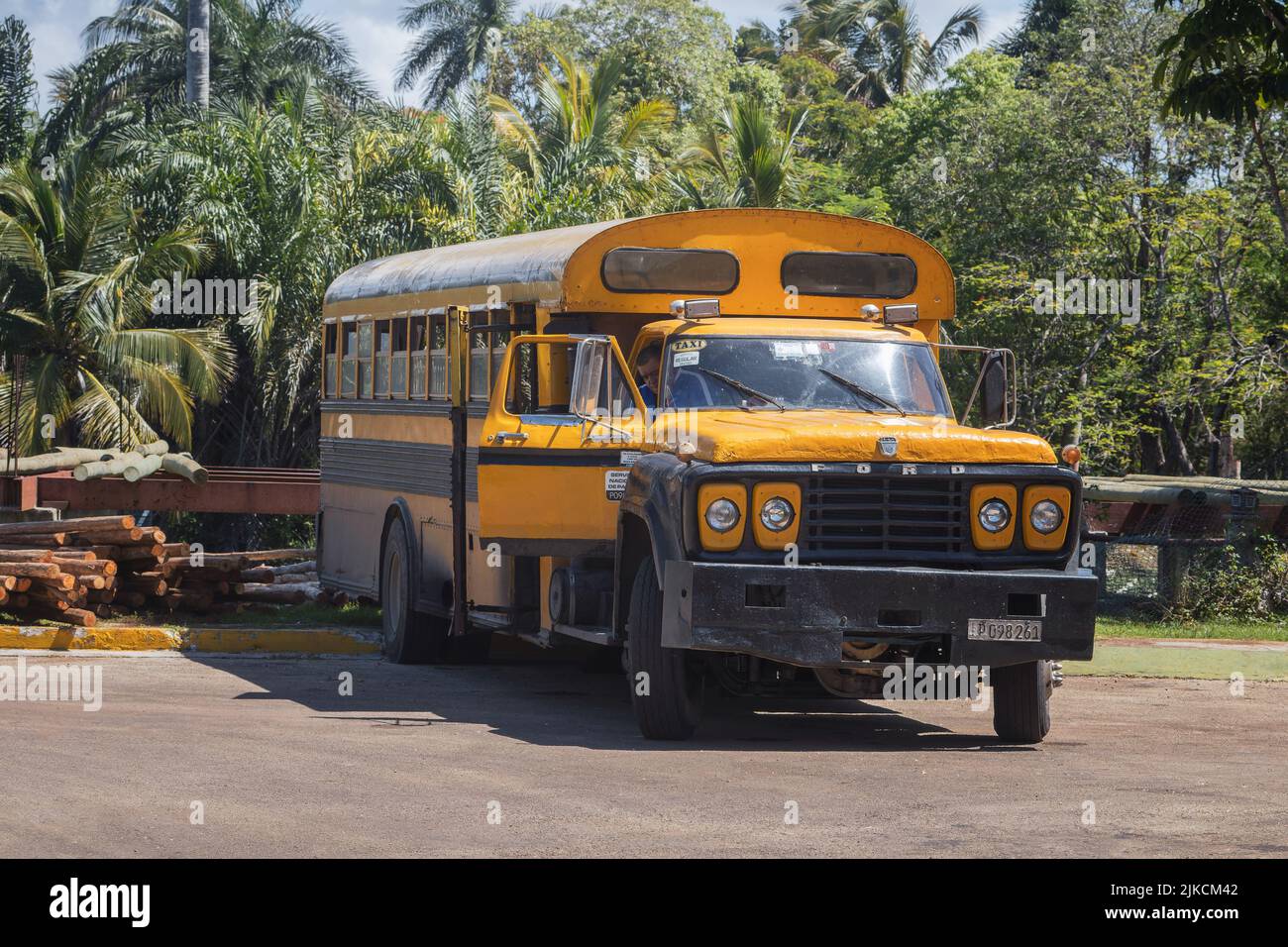 An old bus yellow still in operation Stock Photo - Alamy