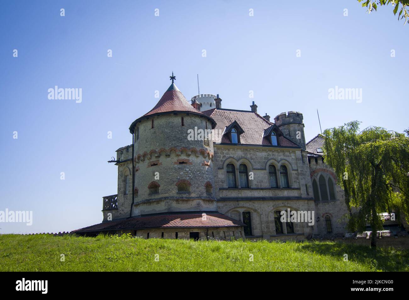 Photo of lichtenstein castle or Schloss on forested rock cliff in ...