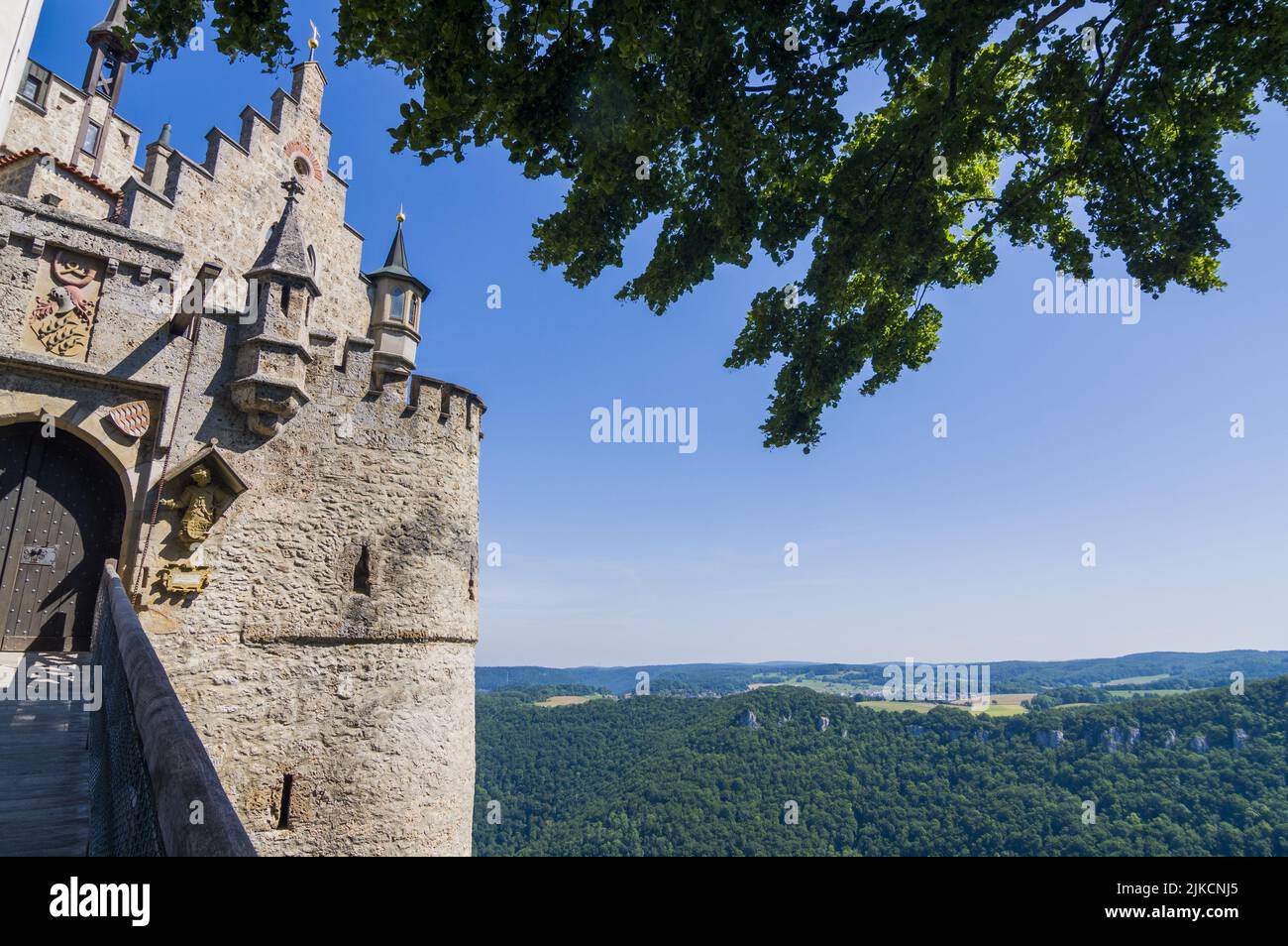 Photo of lichtenstein castle or Schloss on forested rock cliff in ...