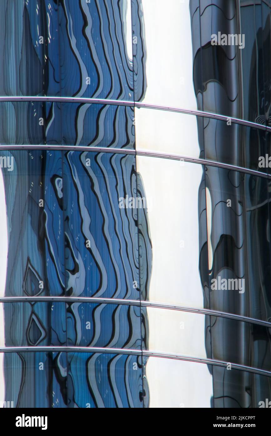 A vertical closeup of modern skyscraper made with glass Stock Photo - Alamy