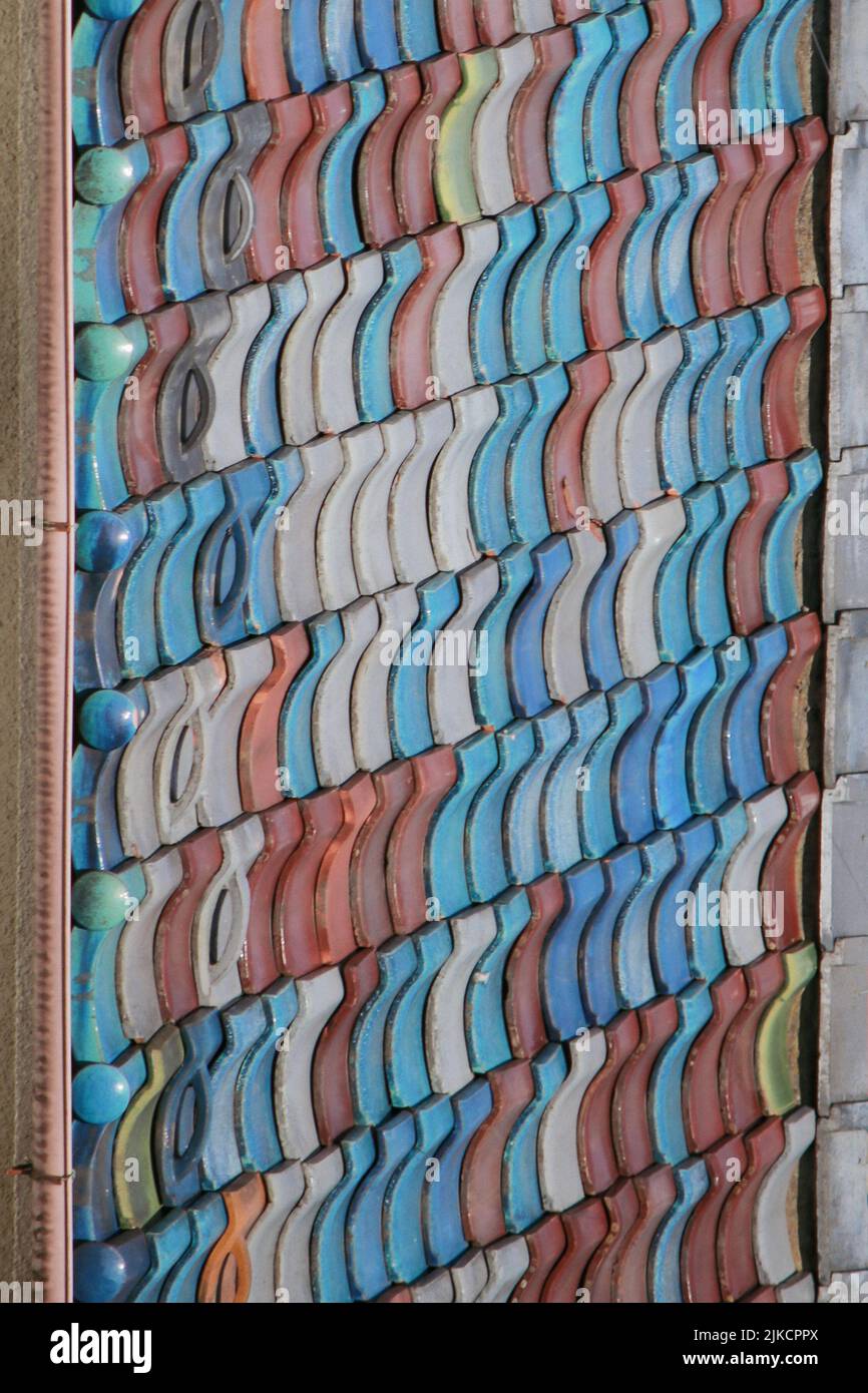 A vertical closeup of a building detail with colorful tiles Stock Photo ...