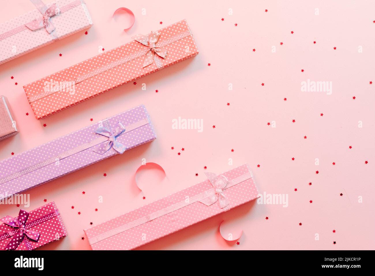 holiday present gift boxes star pattern background Stock Photo - Alamy