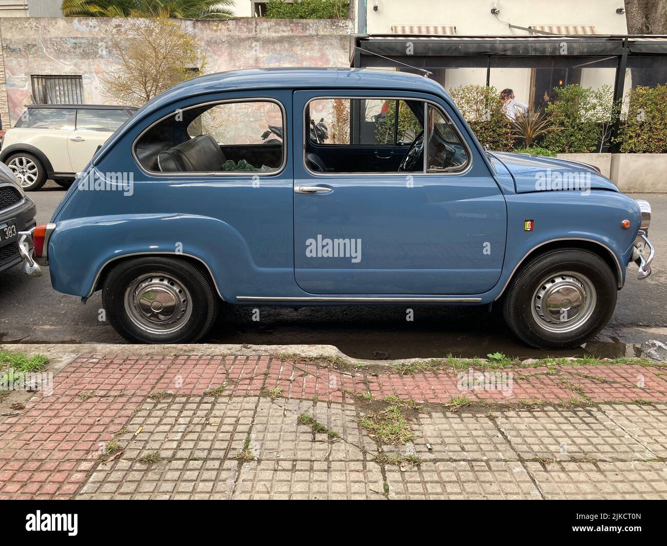 Old, blue Fiat 500 Cinquecento, still in use in Buenos Aires Stock ...