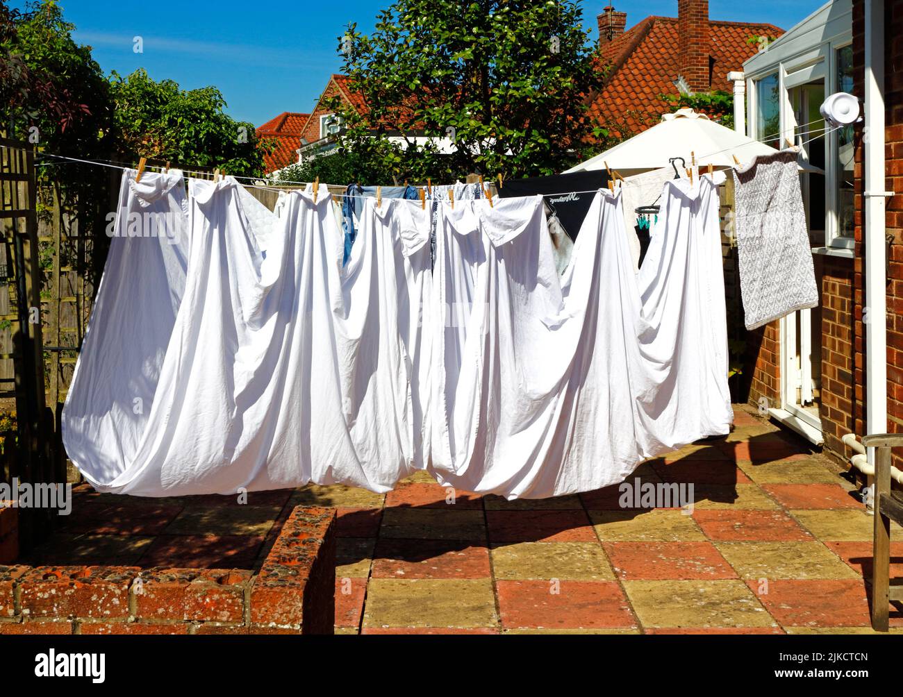 Washing line sheets hi-res stock photography and images - Alamy