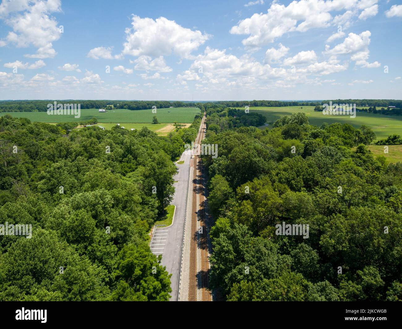 Aerial view of a commuter rail train station in rural Montgomery County ...