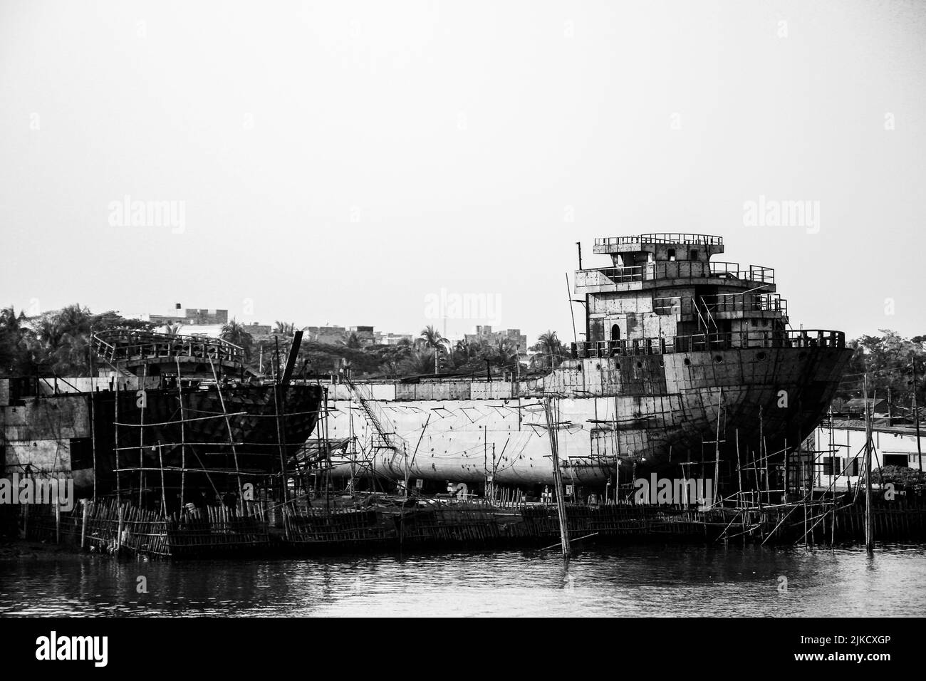 A black and white shot of a ship construction process Stock Photo - Alamy