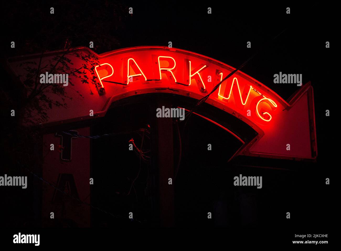 Sign neon parking arrow hi-res stock photography and images - Alamy