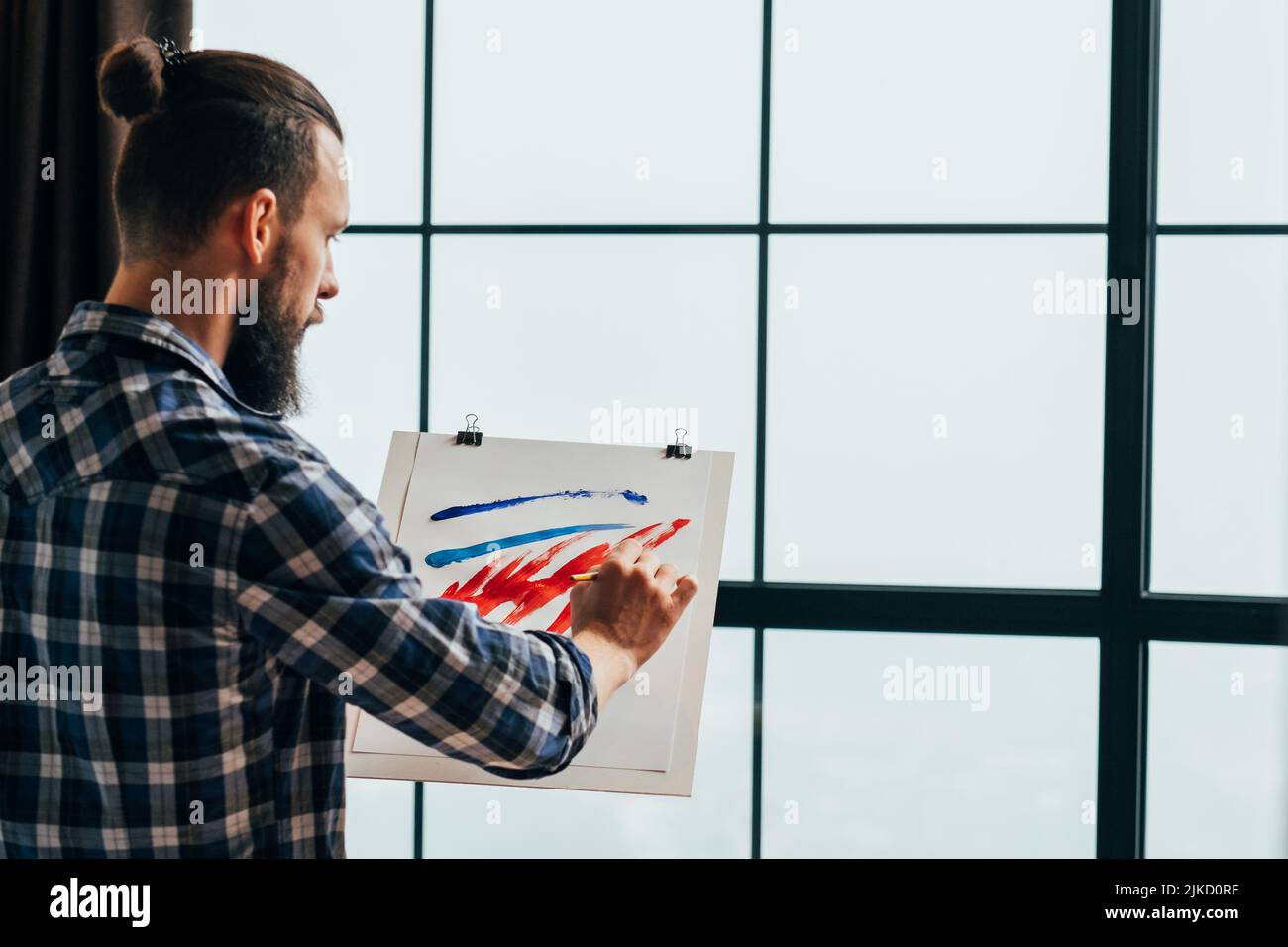 creative hobby inspired young artist painting Stock Photo - Alamy