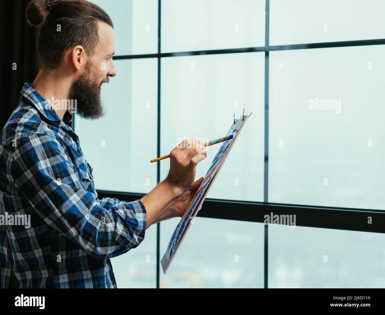 fine art creative process inspired guy painting Stock Photo - Alamy