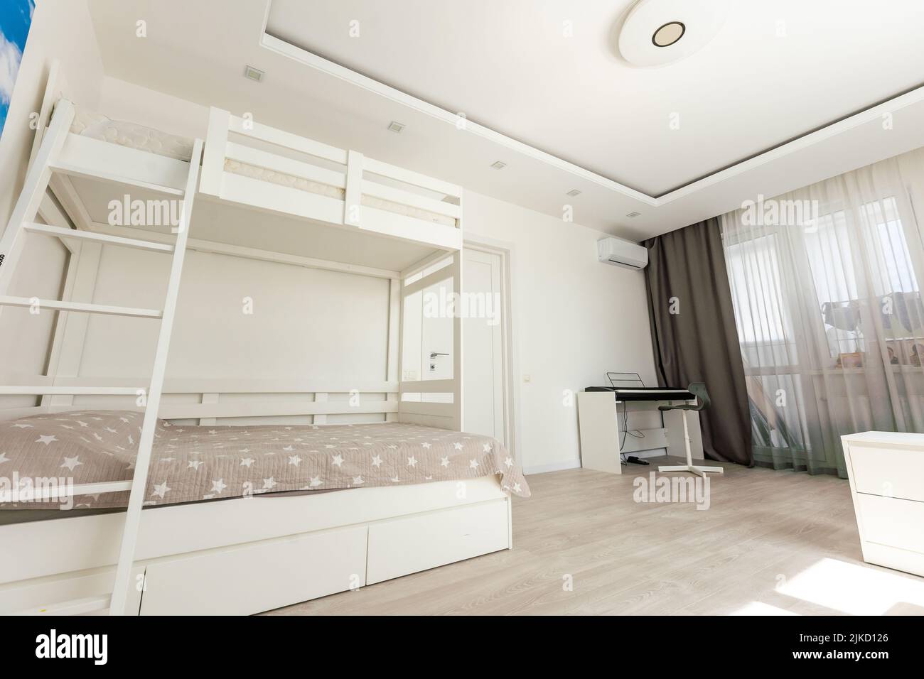 Cute child's room interior with toys and modern furniture Stock Photo ...