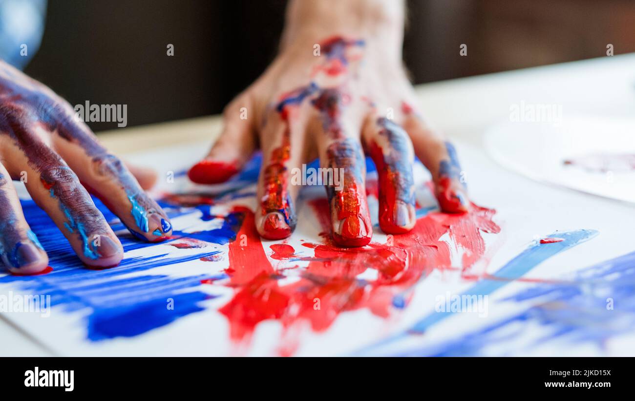 art therapy paint hands creative style technique Stock Photo - Alamy