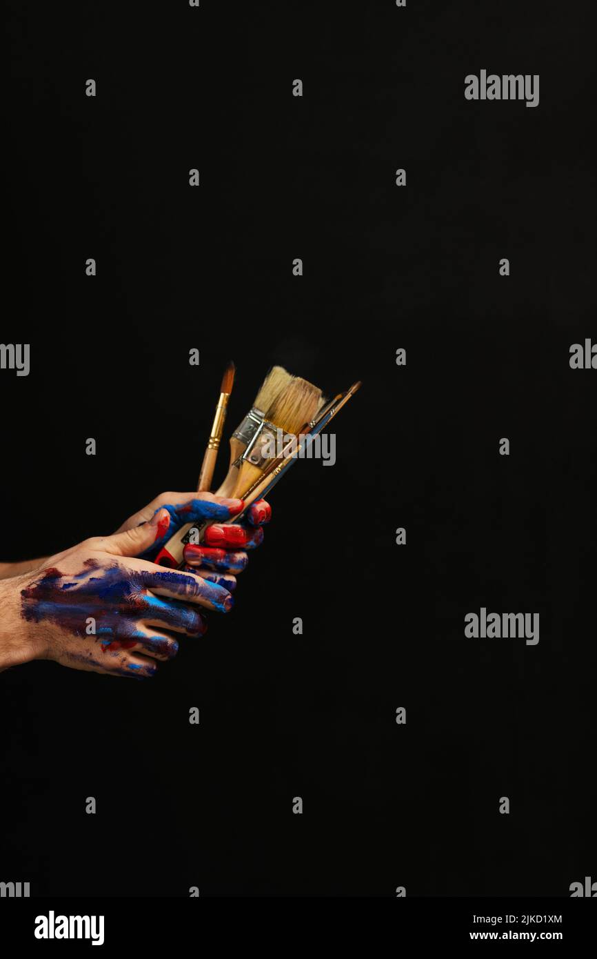 art class school hand paintbrushes artist tools Stock Photo - Alamy