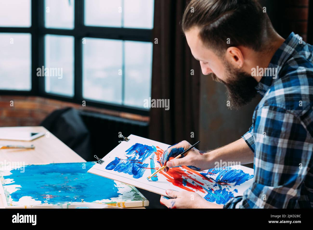 artist painting board inspiration concentration Stock Photo - Alamy